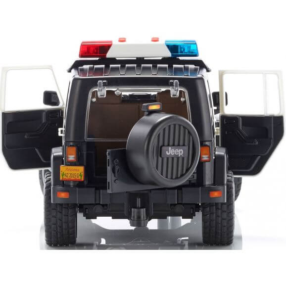 Köp Bruder Leksak Polisbil Jeep Wrangler med Polis